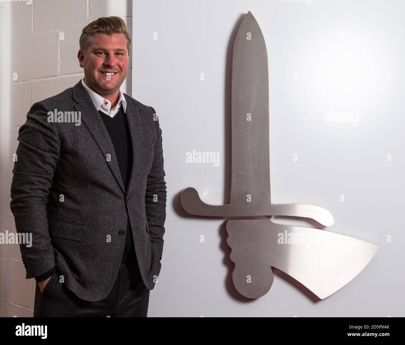 Charlton Athletic's new manager Karl Robinson poses after his press ...