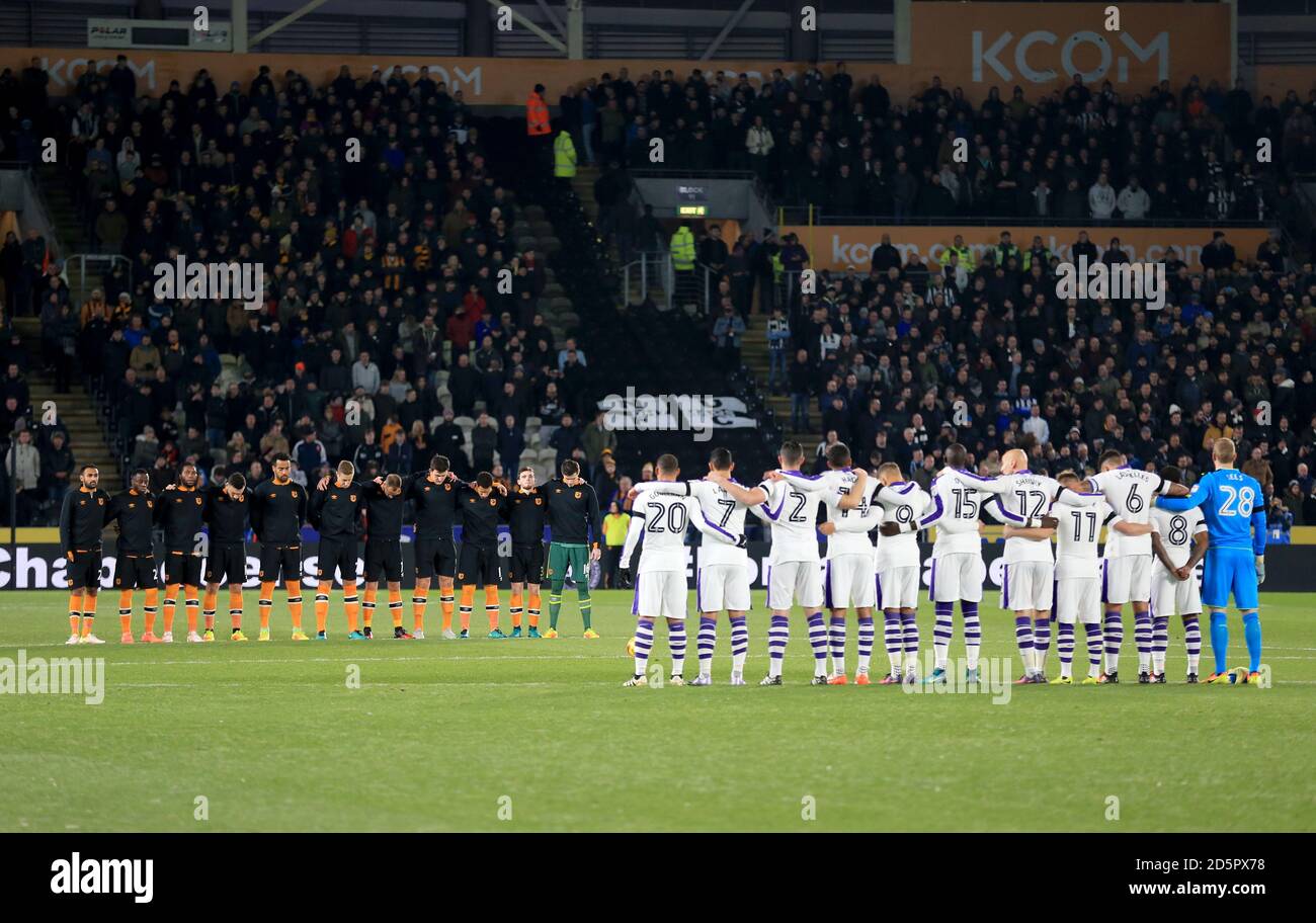 Hull City and Newcastle United players observe a minute's silence, in ...