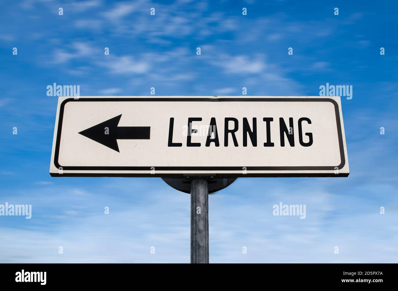White sign with arrow - Learning. Direction sign. Crossroads Road Sign ...