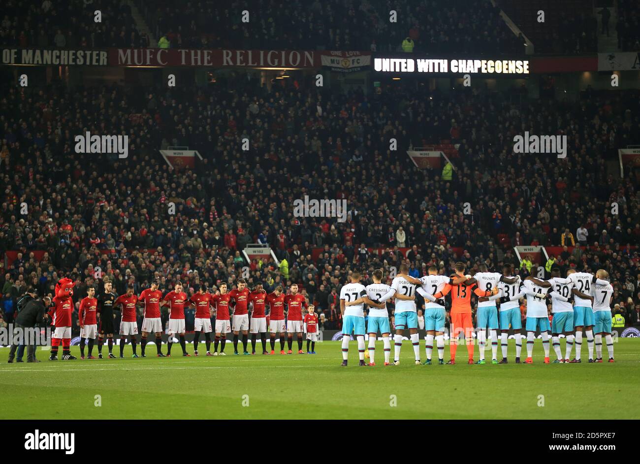 Manchester united stand minutes silence hi-res stock photography and ...
