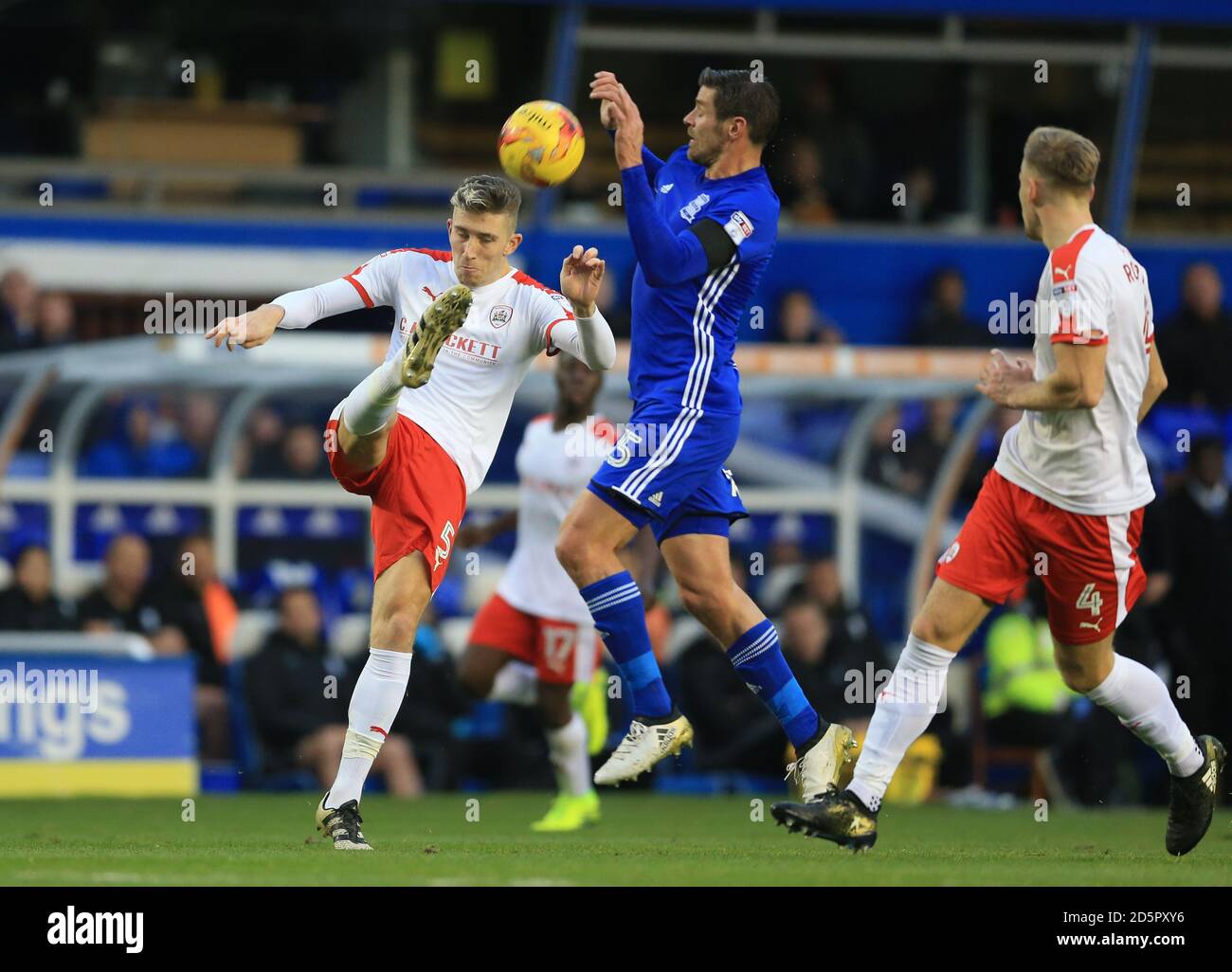 Birmingham City's Lukas Jutkiewicz (centre) and Barnsley's Angus ...