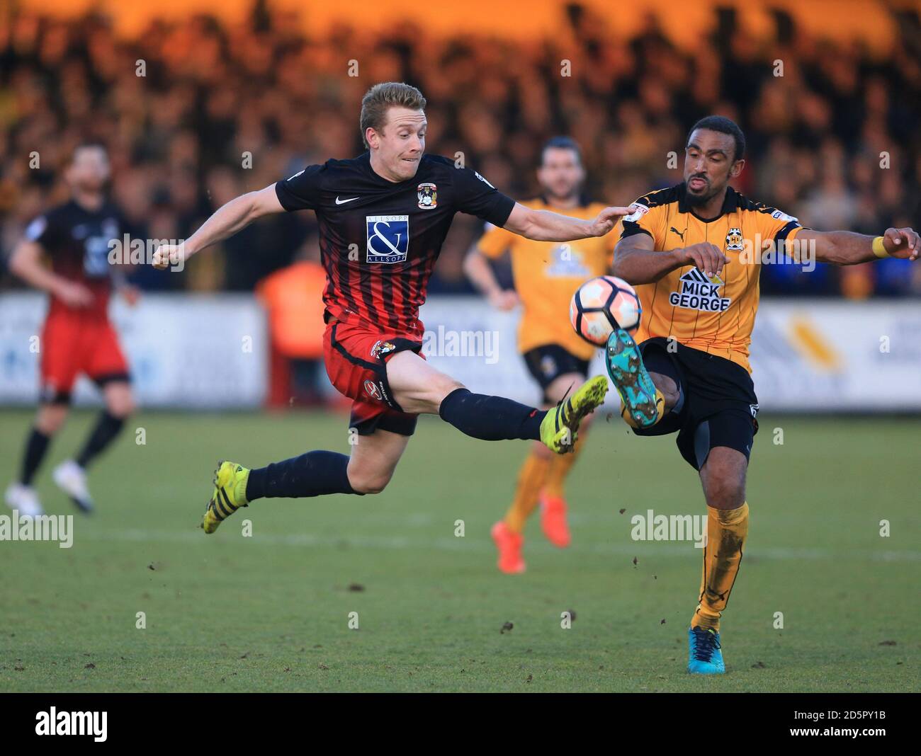 Cambridge United's Leon Legge (right) and Coventry City's Jack McBean ...