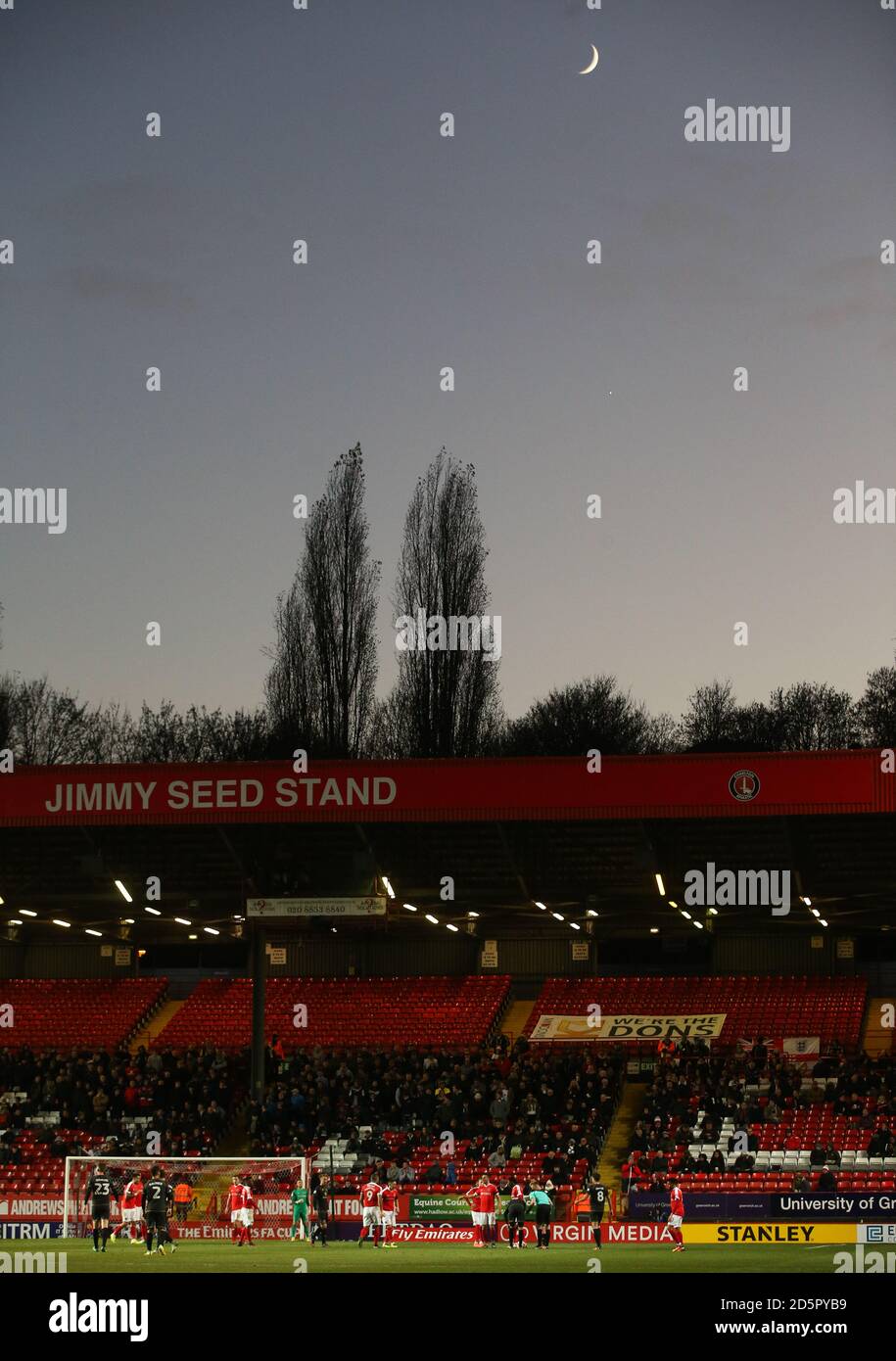 A general view of action on the pitch and the moon behind the Jimmy ...