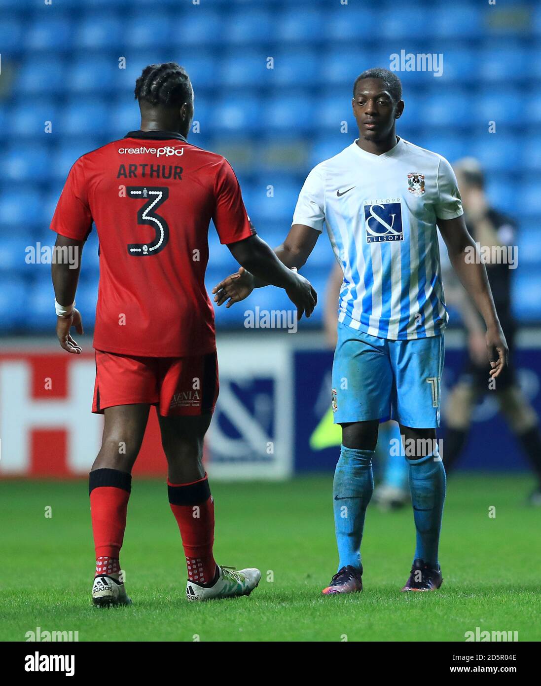 Crawley Town's Chris Arthur and Coventry City's Marvin Sordell shake ...
