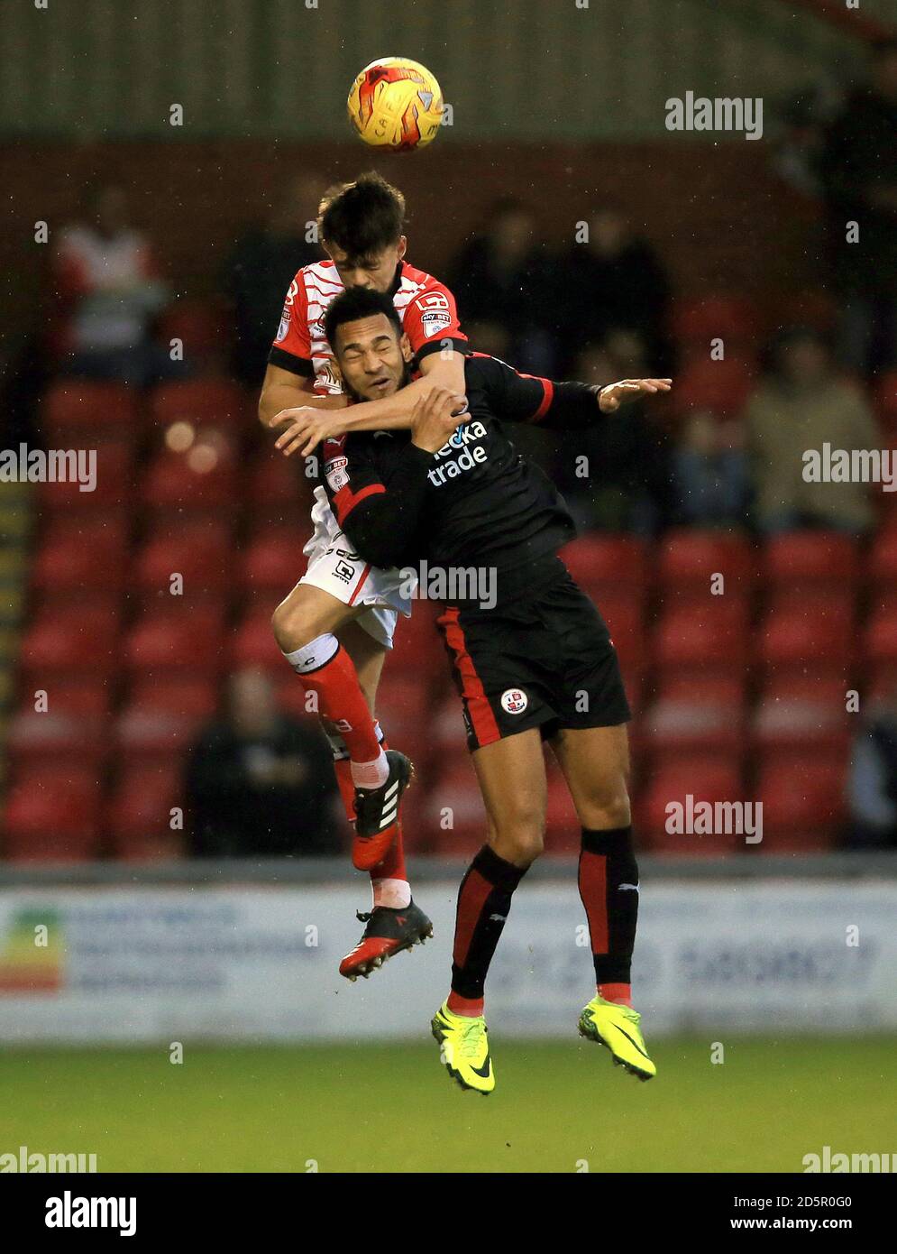 Crewe Alexandra's Perry Ng (Top) and Crawley Town's Jordan Roberts ...
