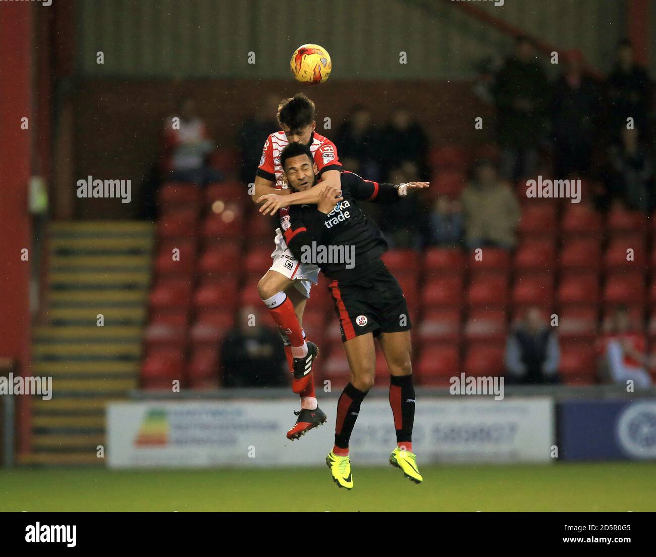 Crewe Alexandra's Perry Ng (Top) and Crawley Town's Jordan Roberts ...