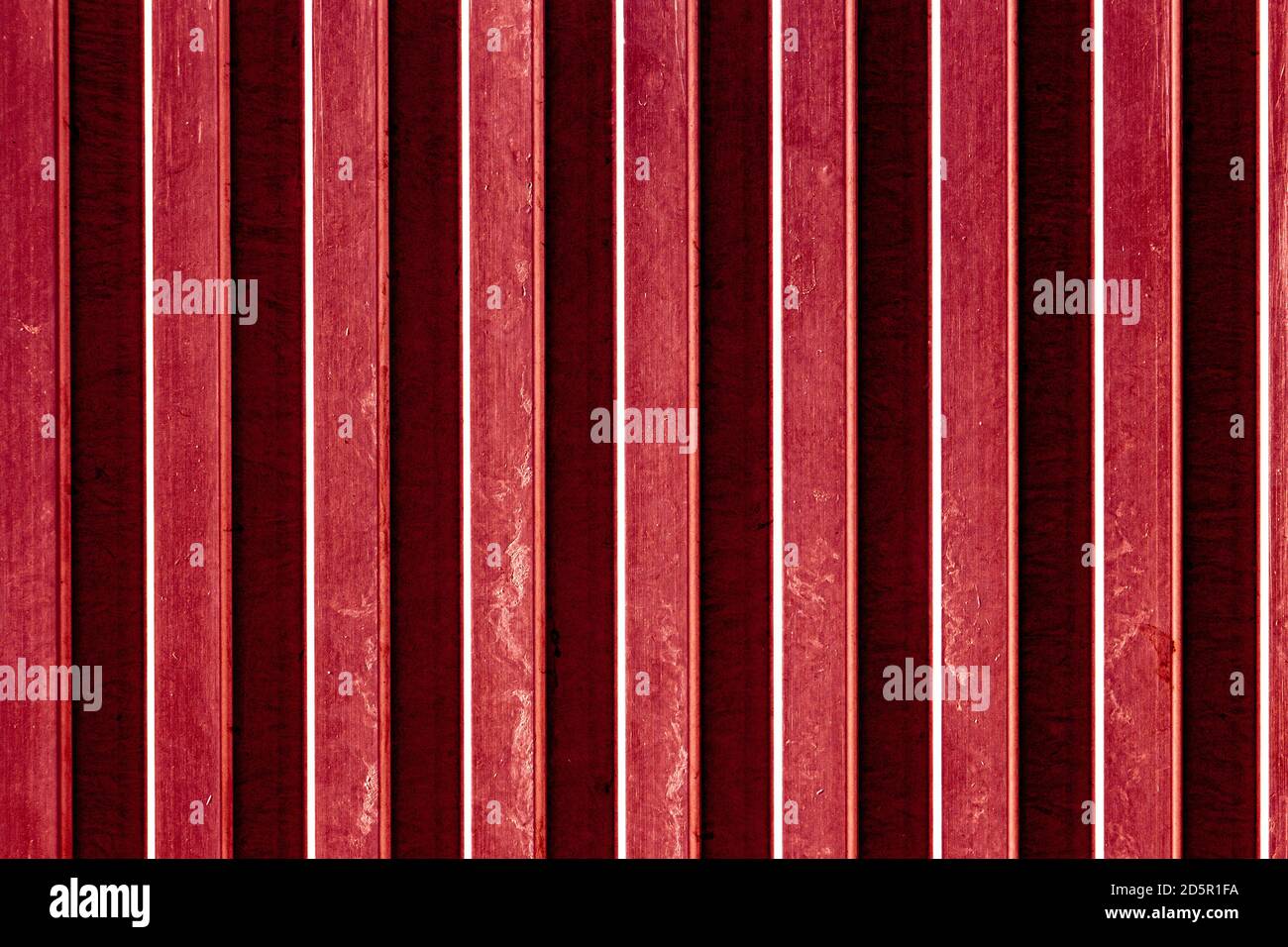 Crimson red vertical lines texture for background Stock Photo - Alamy