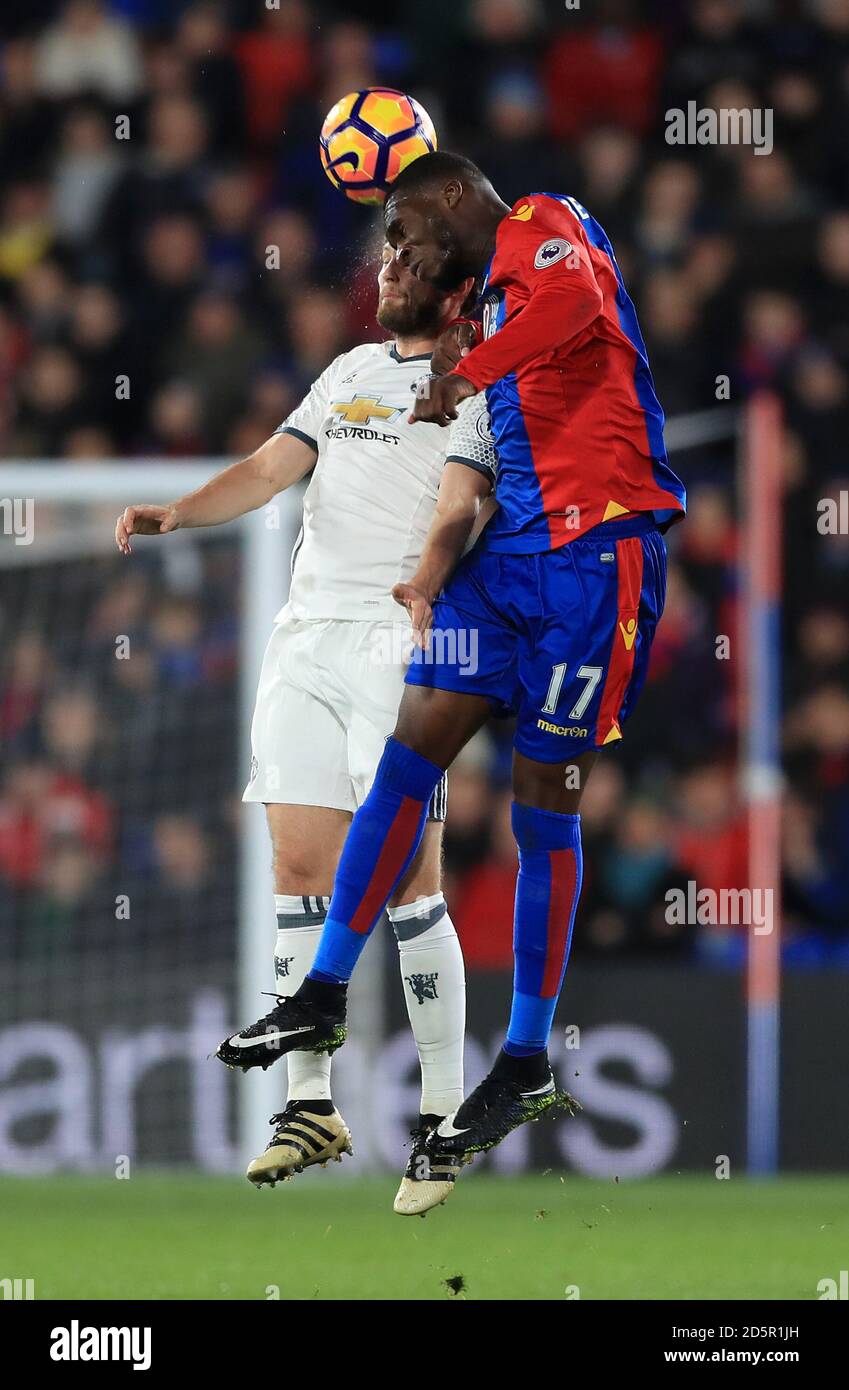 Manchester United's Daley Blind (left) and Crystal Palace's Christian ...
