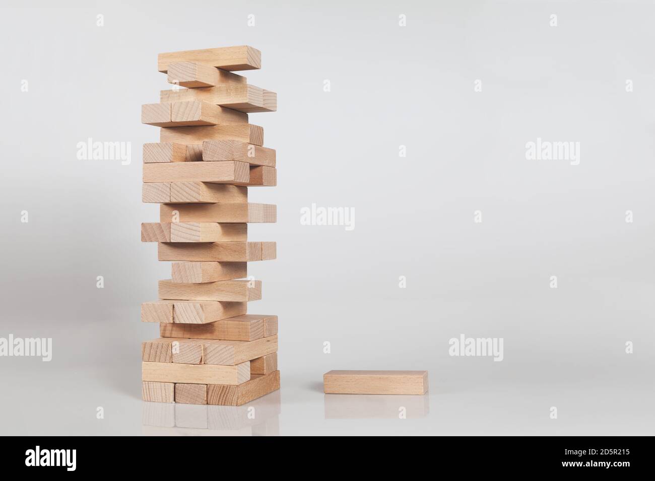 Stack of a wooden block tower isolated on a white background Stock ...
