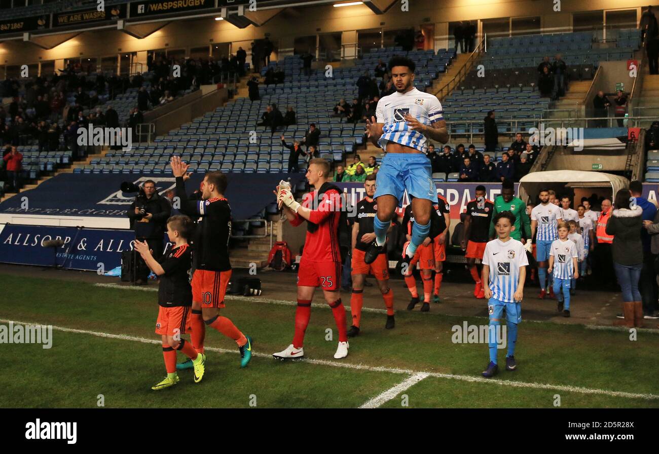 Two teams walk out onto pitch hi-res stock photography and images - Alamy
