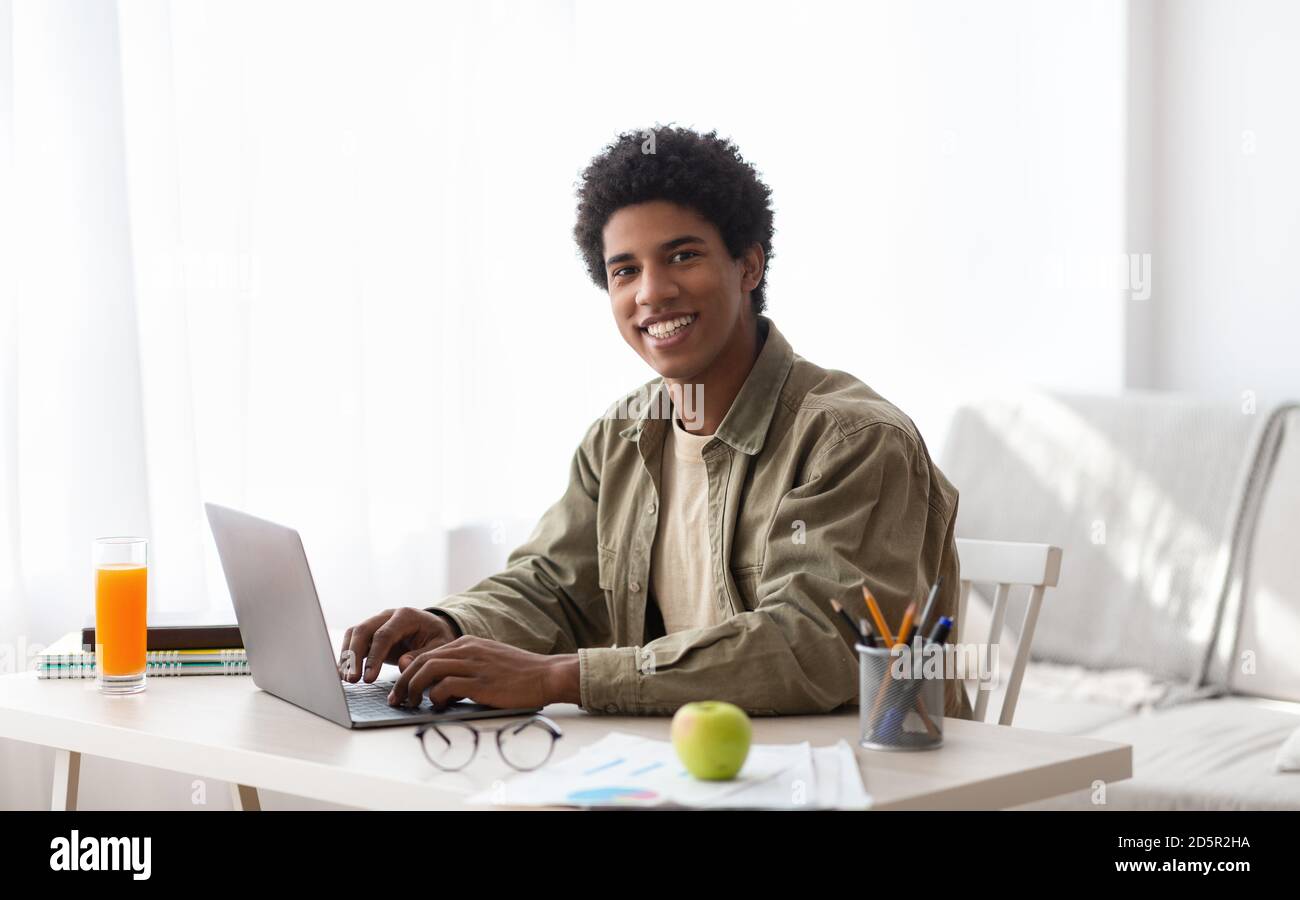 African teenager computer typing hi-res stock photography and images ...
