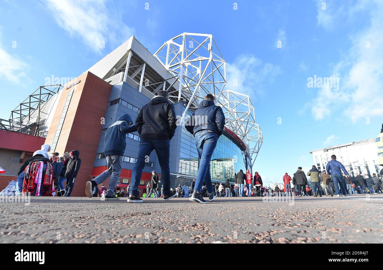 Fans outside Old trafford Stock Photo - Alamy