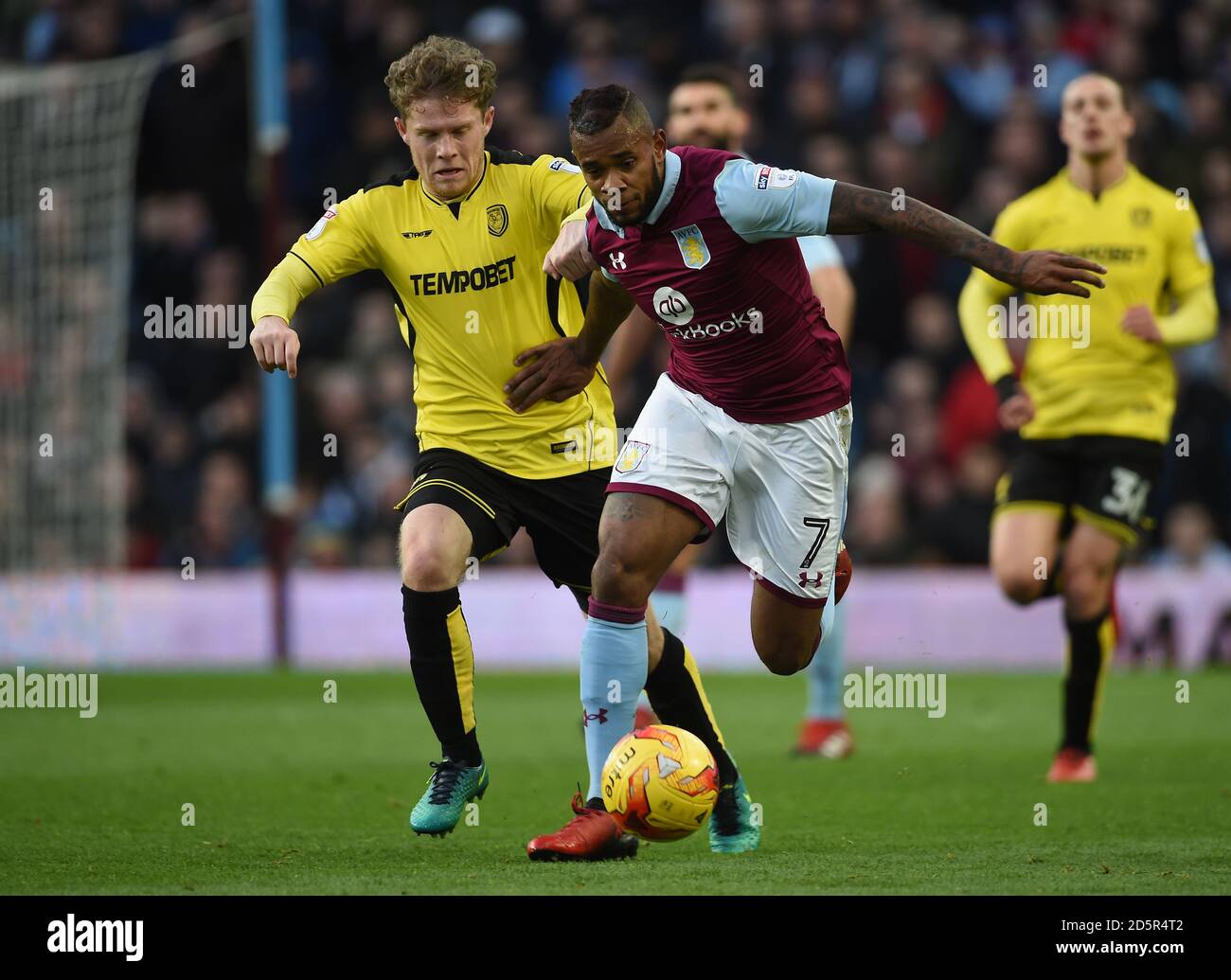 Aston Villa's Leandro Bacuna (right) and Burton Albion's Matty Palmer ...