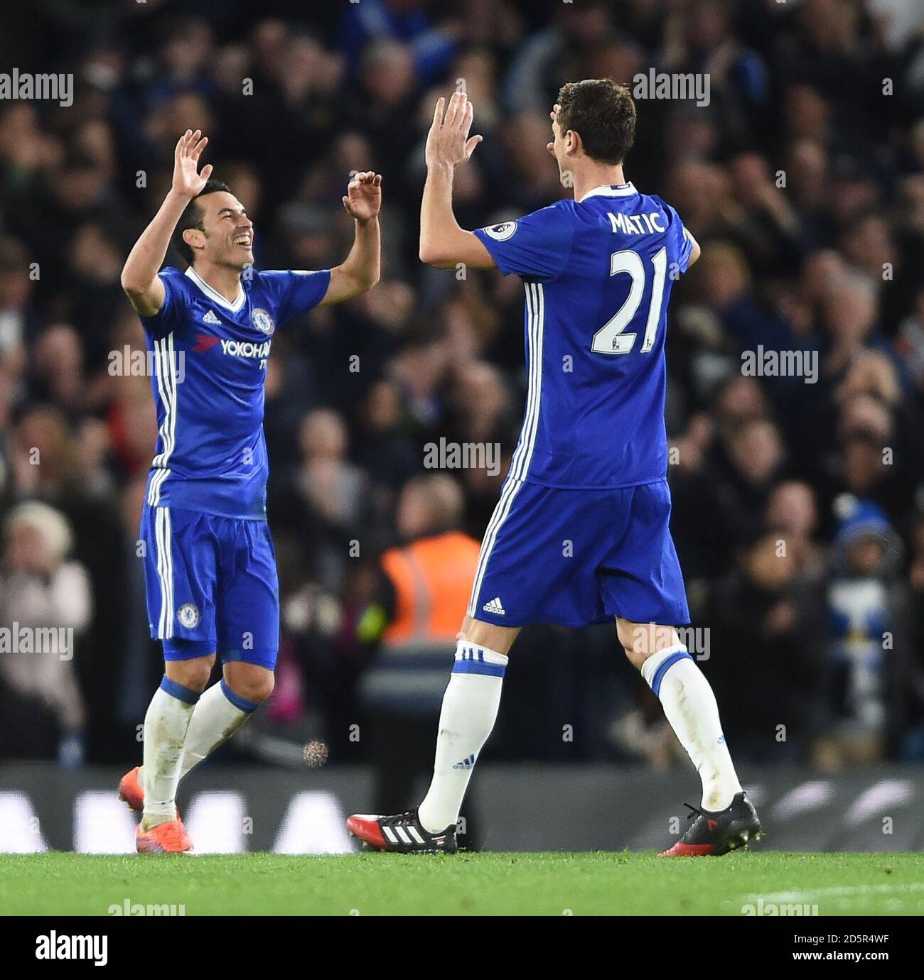 Chelsea's Pedro (left) celebrates scoring their third goal with Nemanja ...