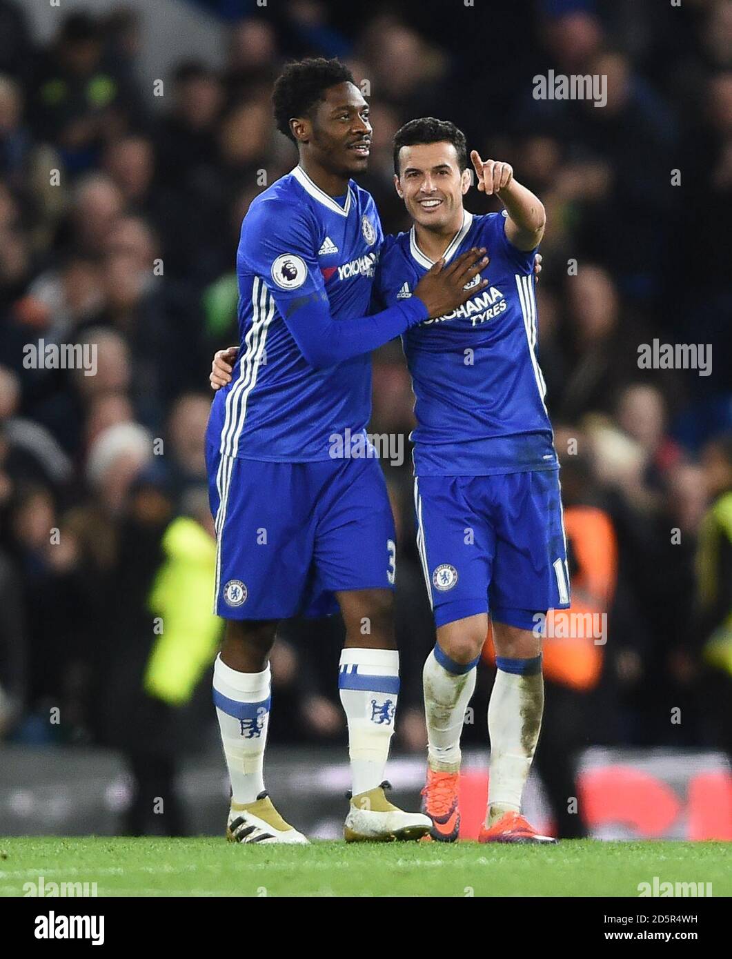 Chelsea's Pedro (right) celebrates scoring their third goal with Ola ...
