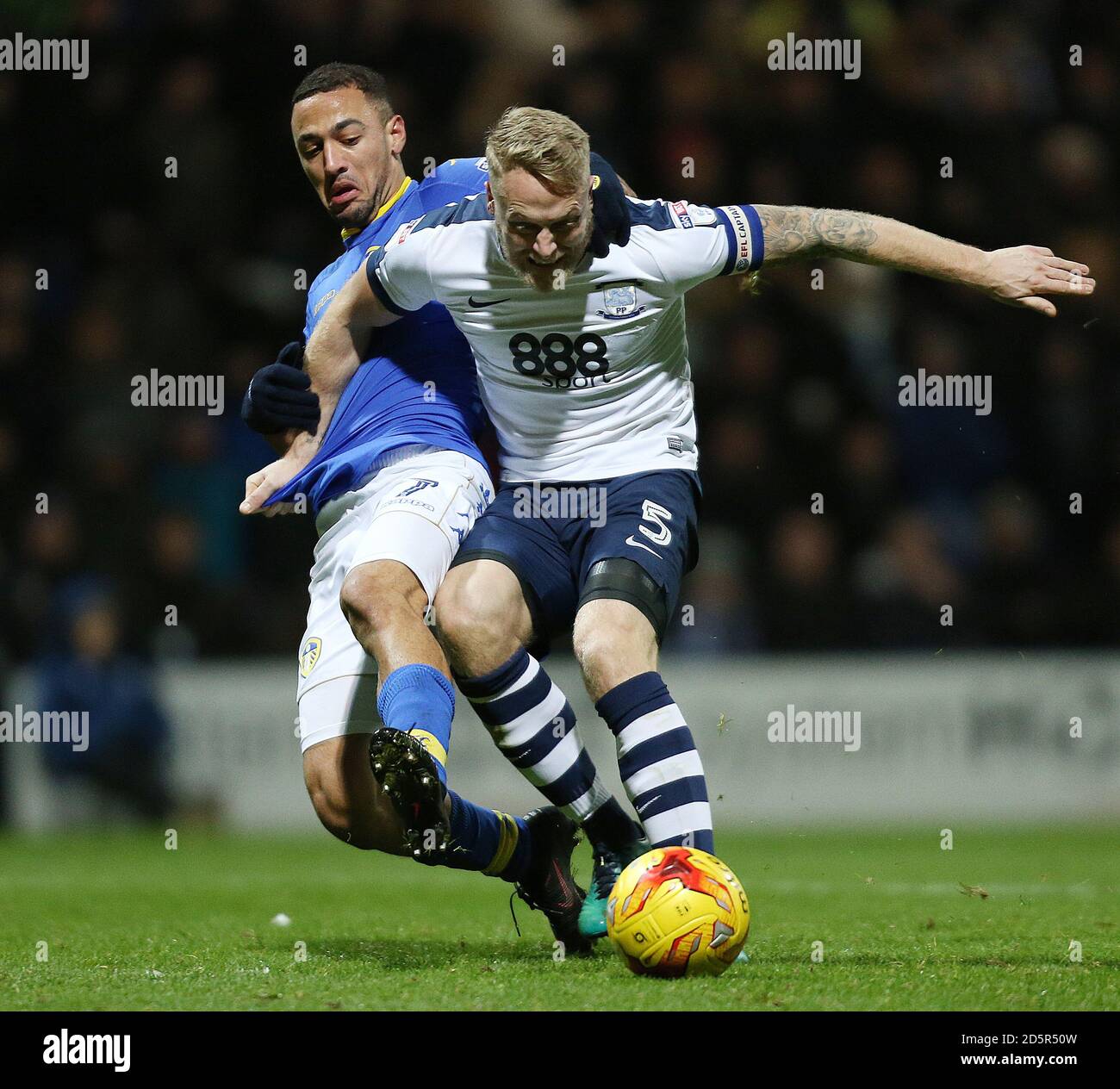 Leeds United's Kemar Roofe (left) and Preston North End's Tom Clarke ...