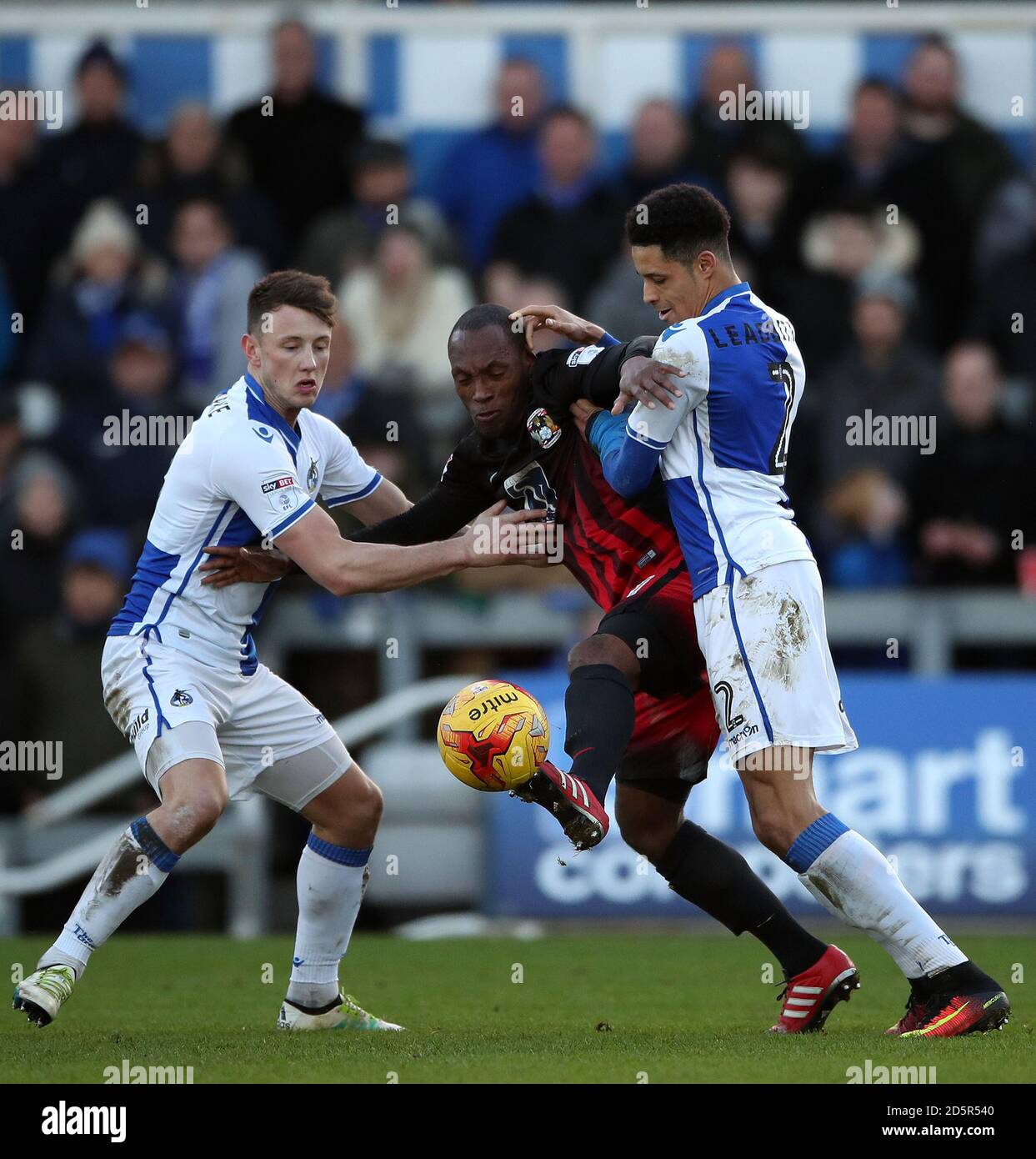 Coventry City's Kyel Reid battles between Bristol Rovers pair Daniel ...