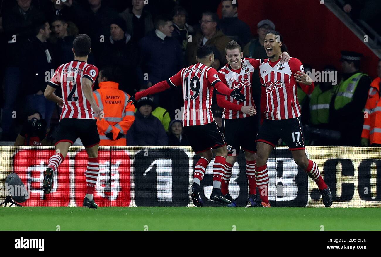 Southampton's Virgil van Dijk (right) celebrates after he heads home ...