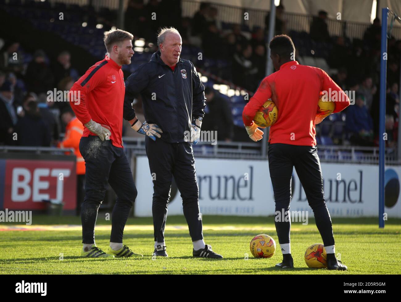 Coventry City goalkeeping coach Steve Ogrizovic (centre) with Lee Burge ...