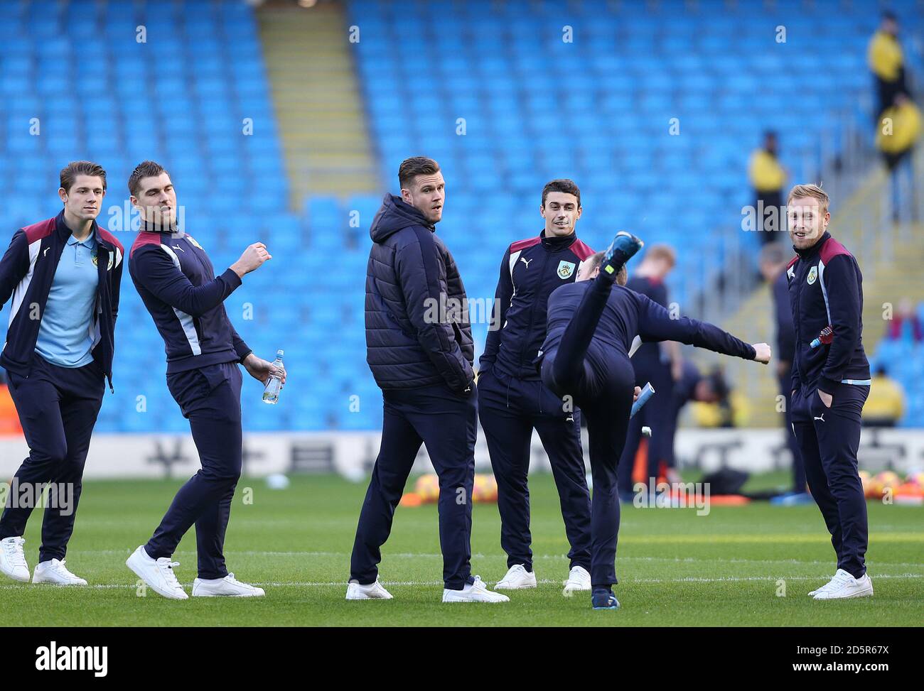 Burnley players on the pitch before the game at the Etihad Stadium ...