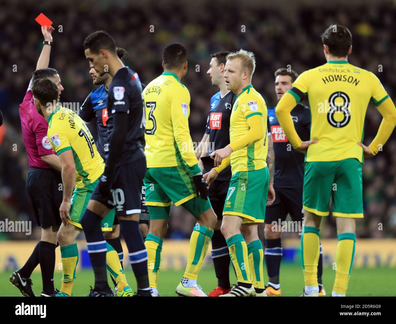 Referee Darren Bond sends off Derby County's Jacob Butterfield (hidden ...