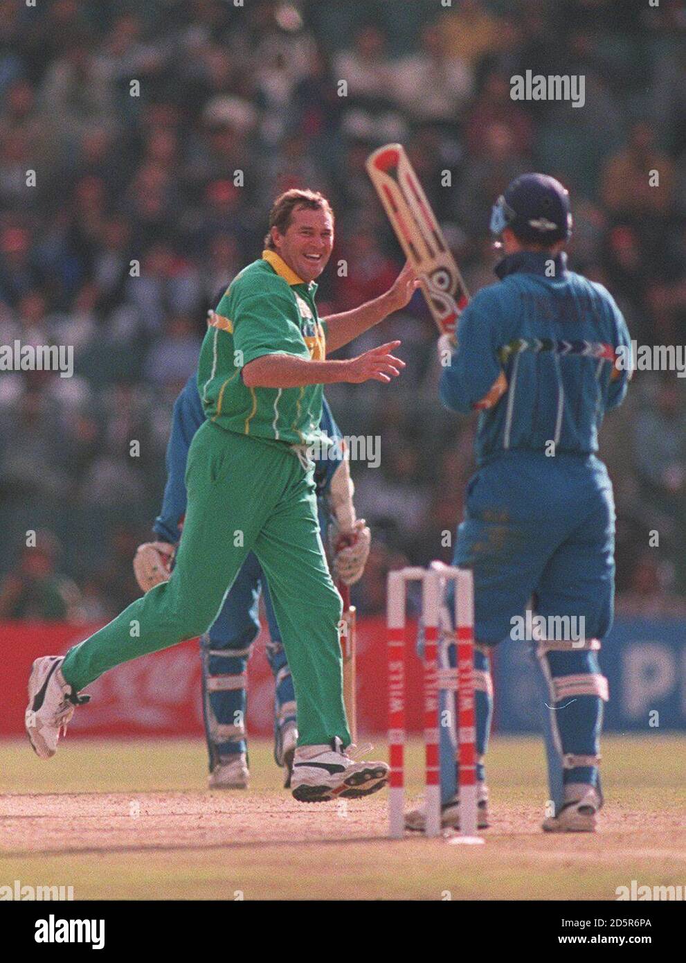 South Africa's Pat Simcox (centre) celebrates after dismissing England ...