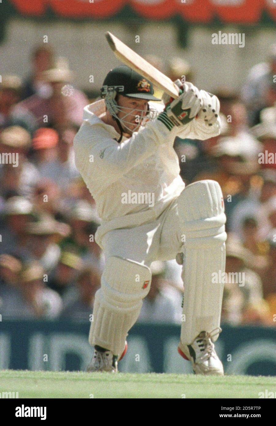 Australia's Damien Fleming on his way to an unbeaten 71 against England ...