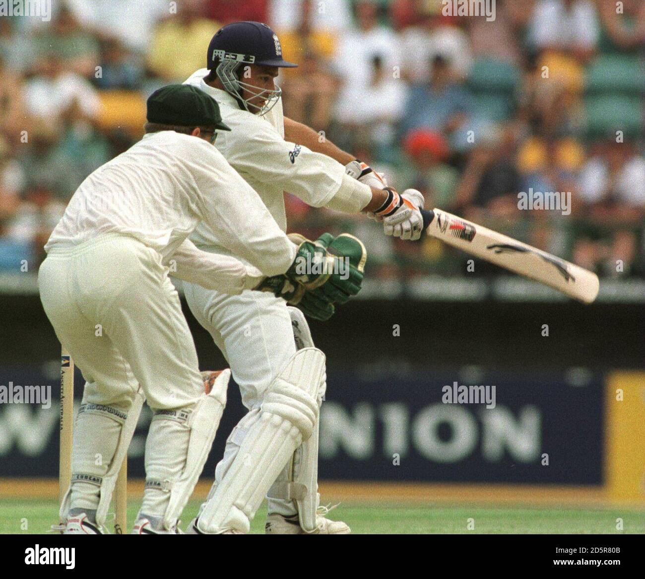 England's Mark Ramprakash pulls in front of Australian keeper Ian Healy ...