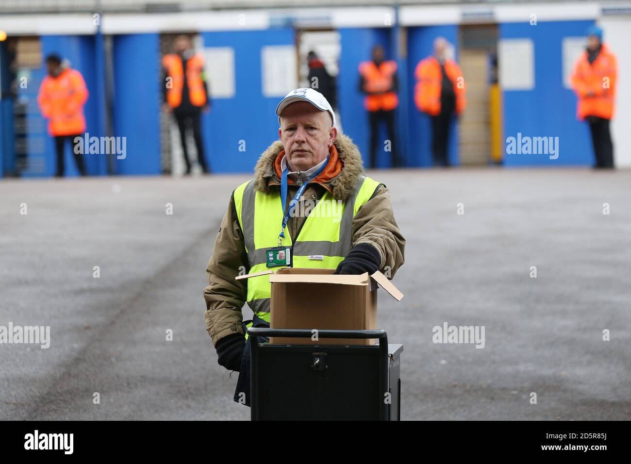 Programme seller outside the ground Stock Photo - Alamy