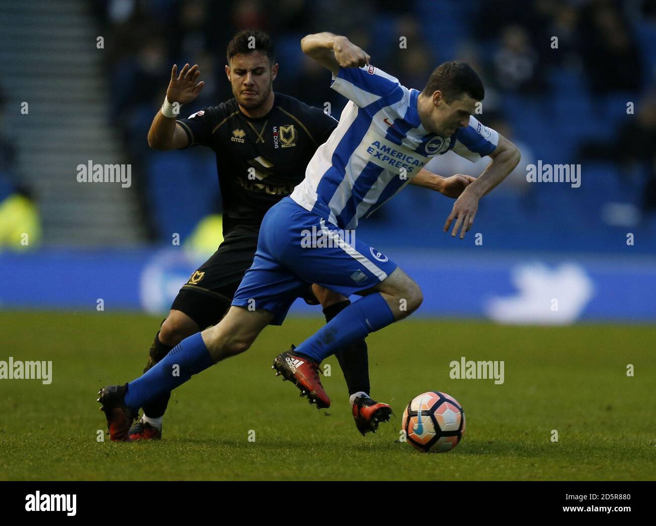 Brighton & Hove Albion's Jamie Murphy and Milton Keynes Dons' George ...