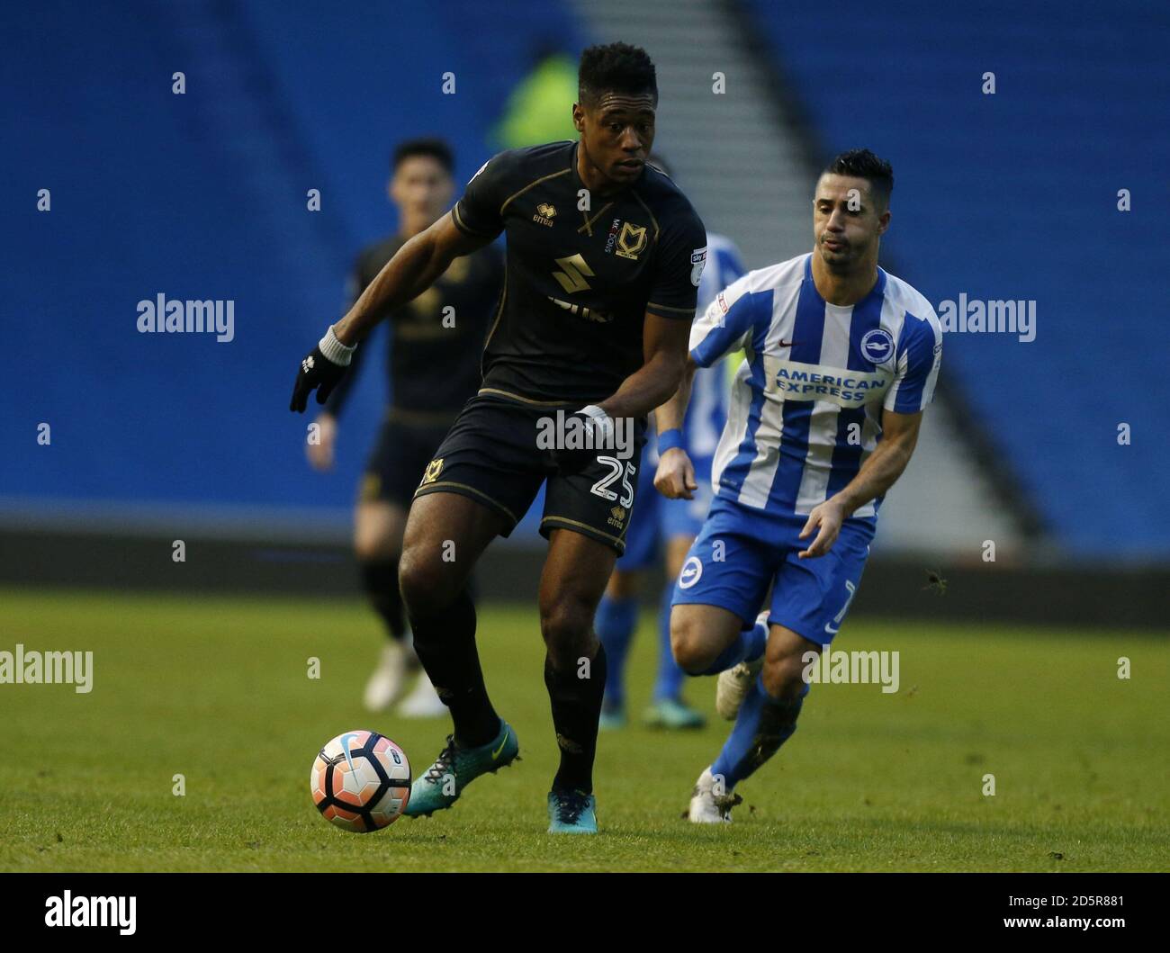 Brighton & Hove Albion's Beram Kayal and Milton Keynes Dons' Chuks ...