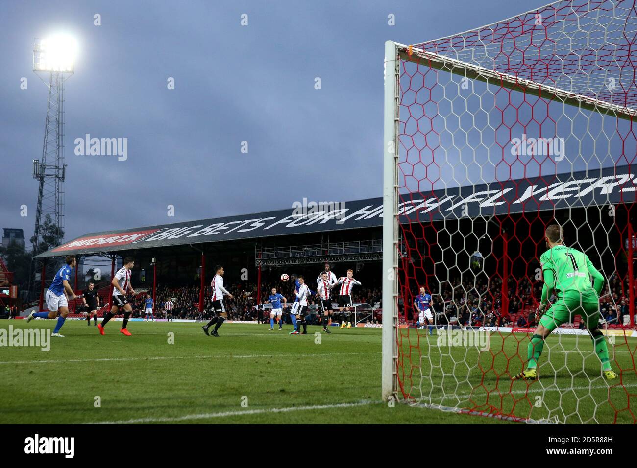 Eastleigh's Luke Coulson has his free kick saved by Brentfordâ€™s ...