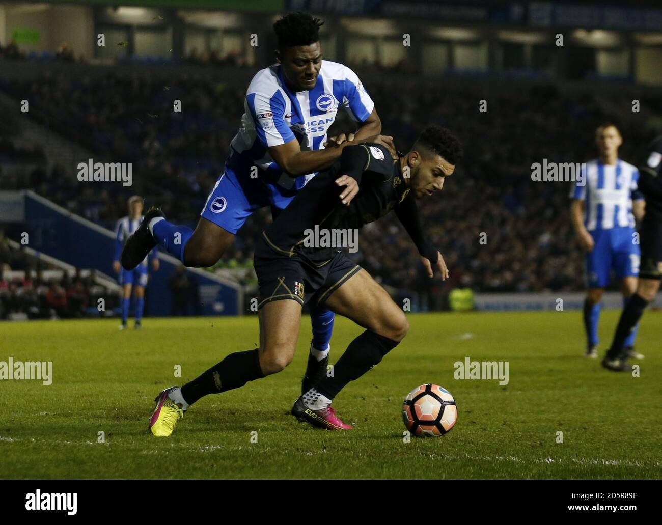 Brighton & Hove Albion's Rohan Ince and Milton Keynes Daniel Powell ...