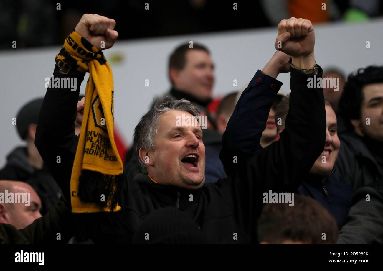 A Wolverhampton Wanderers fan celebrates after the final whistle Stock ...
