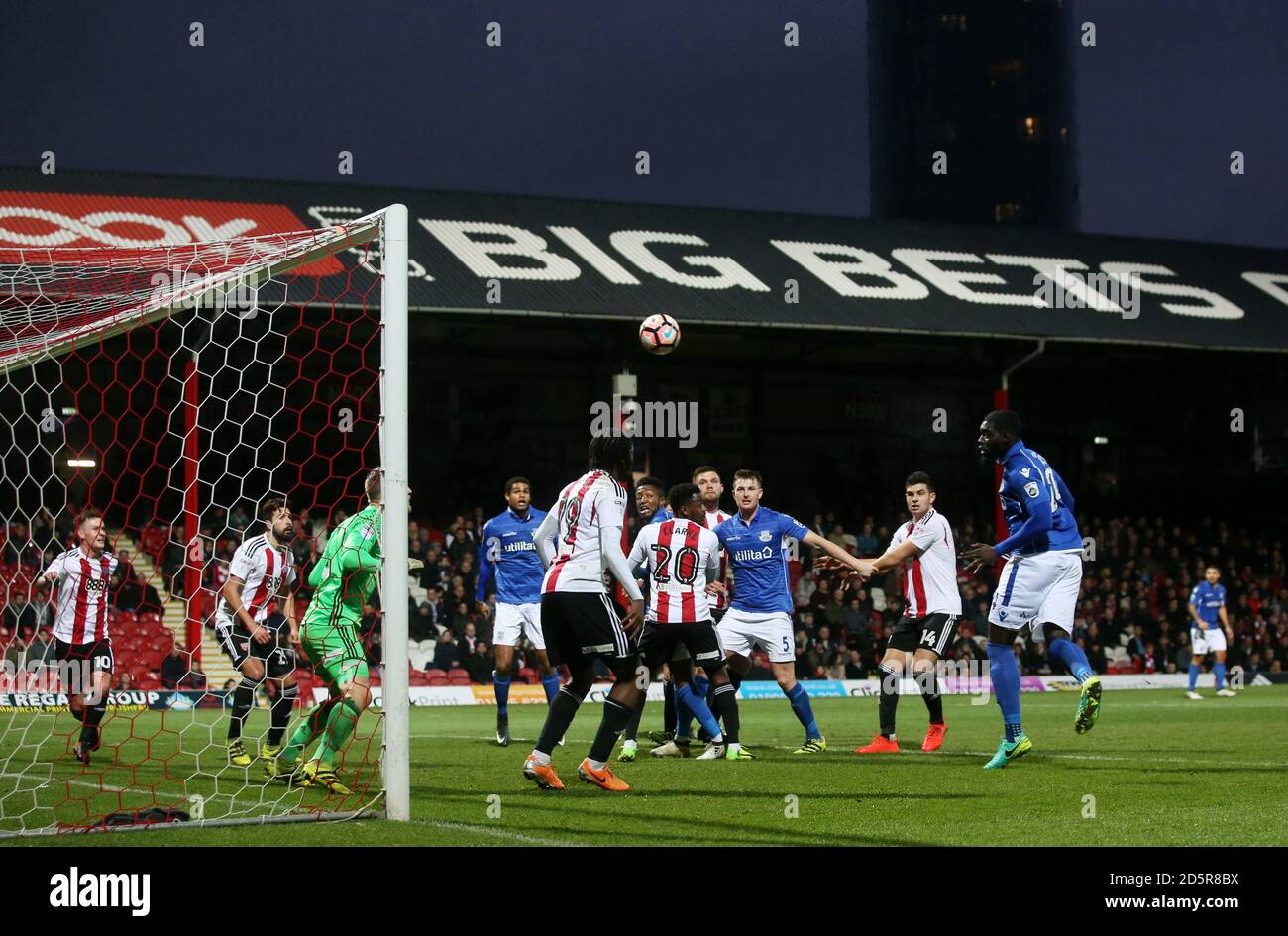 Eastleighâ€™s Ayo Obileye heads towards goal Stock Photo - Alamy