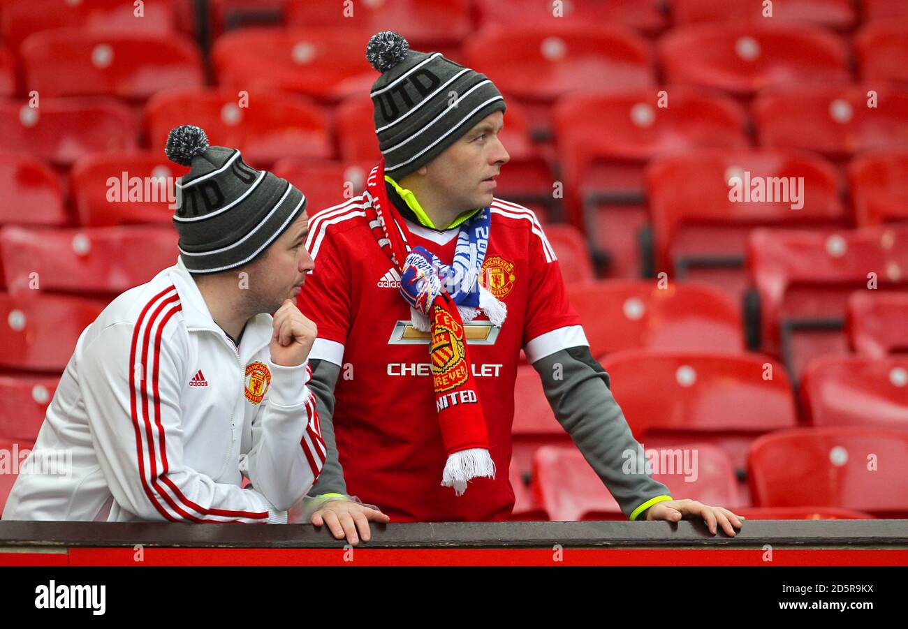 Manchester United fans in the stands Stock Photo - Alamy