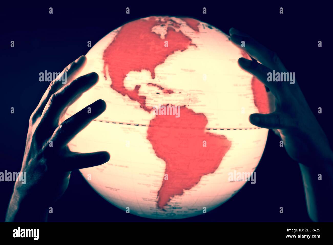 Hands holding globe hi-res stock photography and images - Alamy