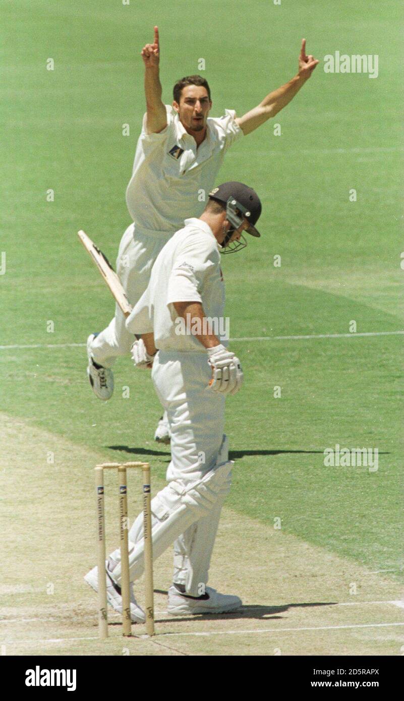 Australia's Jason Gillespie celebrates the wicket of Graeme Hicks ...
