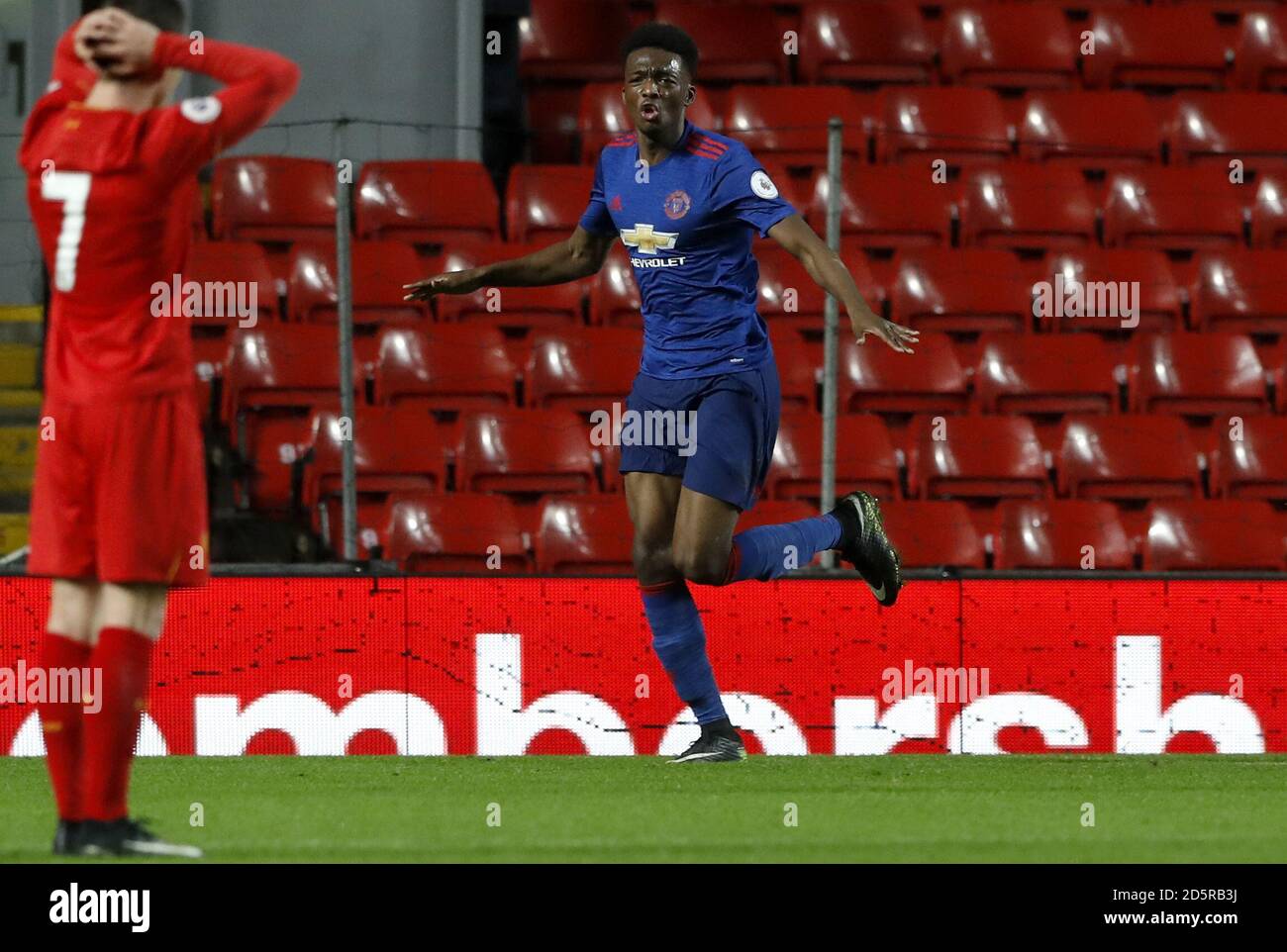 Manchester United's Matthew Willock (right) celebrates his goal against ...