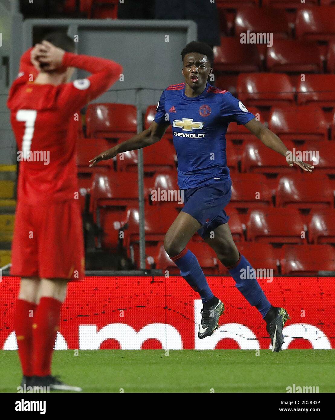 Manchester United's Matthew Willock (right) celebrates his goal against ...