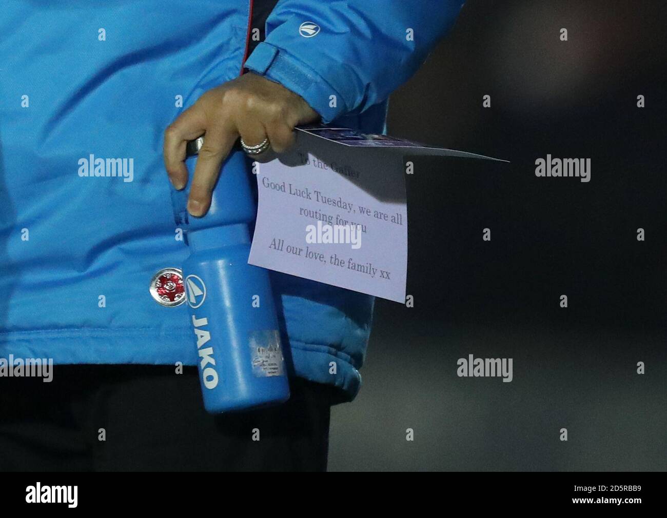A good luck card is held by Sutton United's manager Paul Doswell before ...