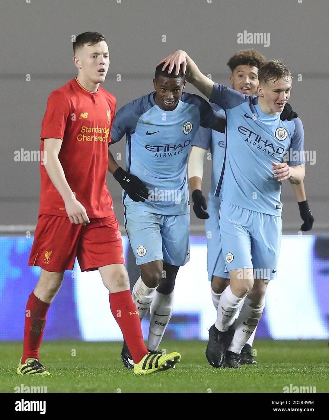 Manchester City's Sadou Diallo (left) celebrates scoring his teams 2nd ...