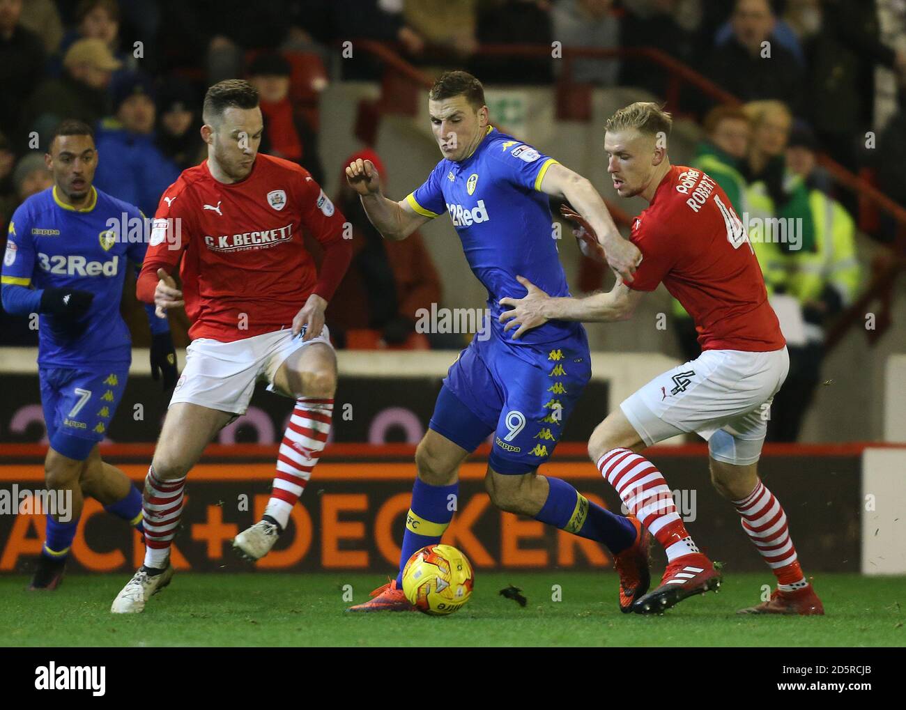 Barnsley's Gethin Jones, Marc Roberts and Leeds United's Chris Wood ...