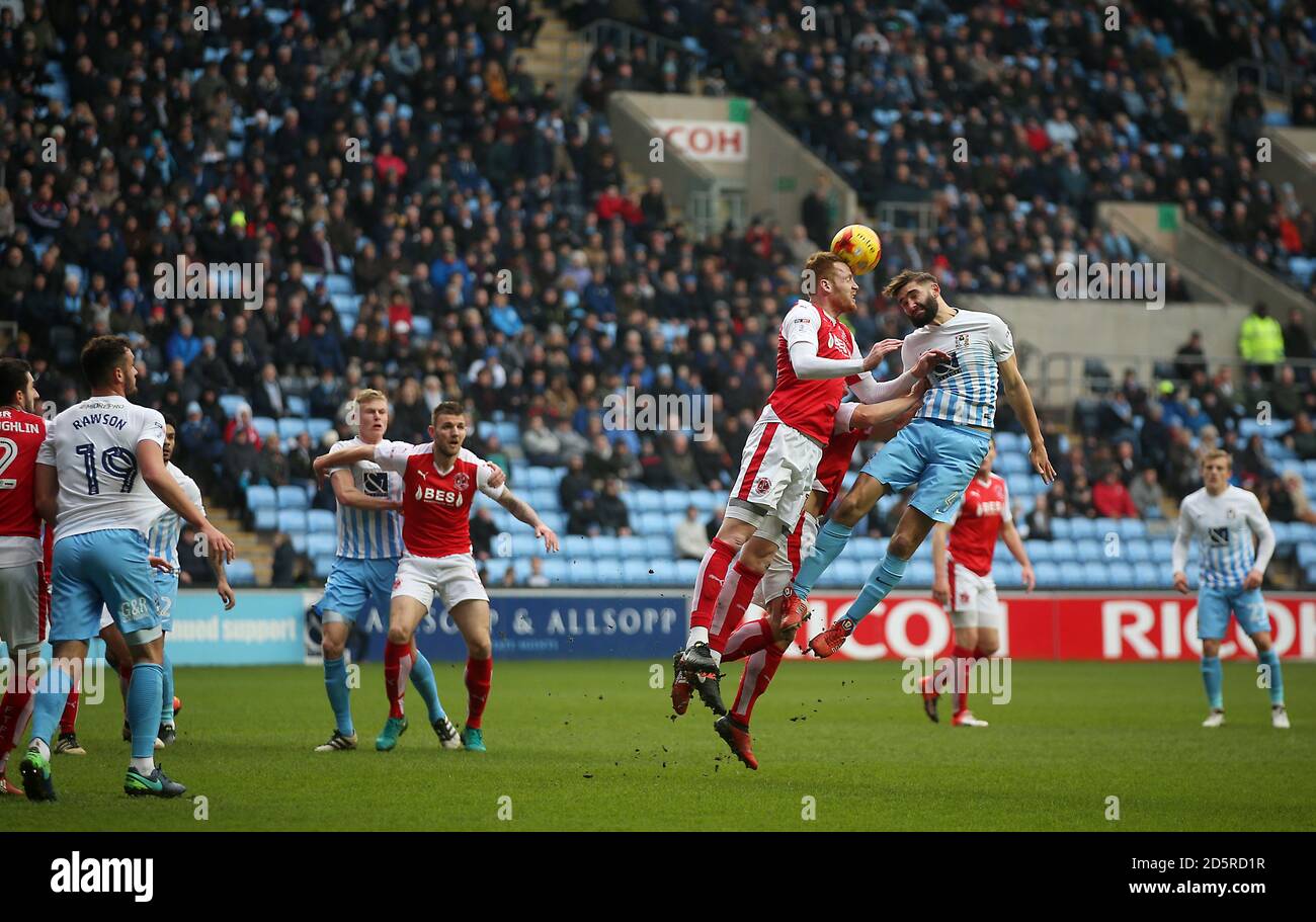 Coventry City's Jordan Turnball (right) loses out to Fleetwood Town's ...
