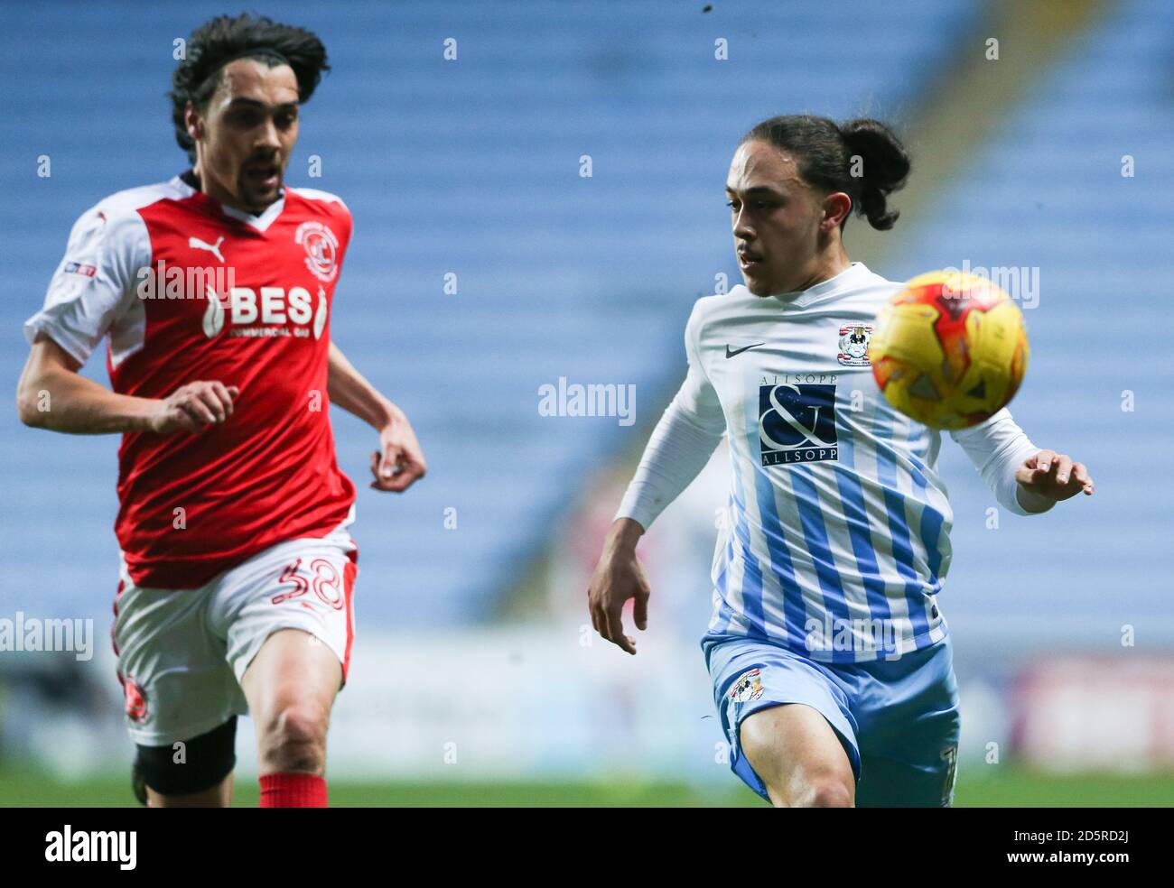 Coventry City's Jodi Jones and Fleetwood Town's Marcus Schwabi (left ...