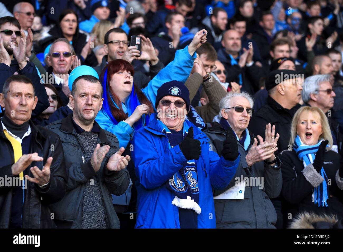 Wycombe Wanderers fans in the stands Stock Photo - Alamy