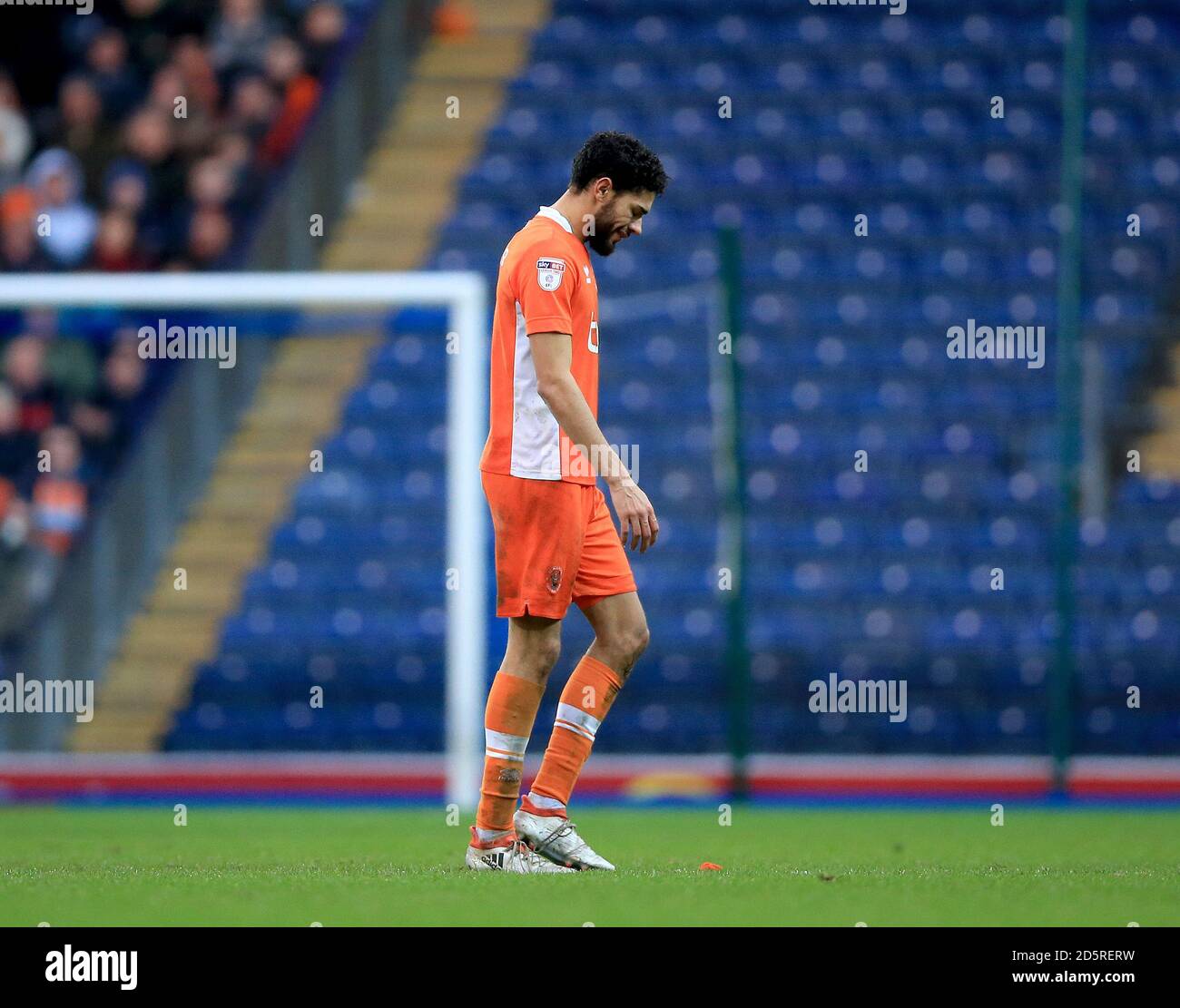 Blackpool's Kelvin Mellor walks off the pitch after he is shown a red ...