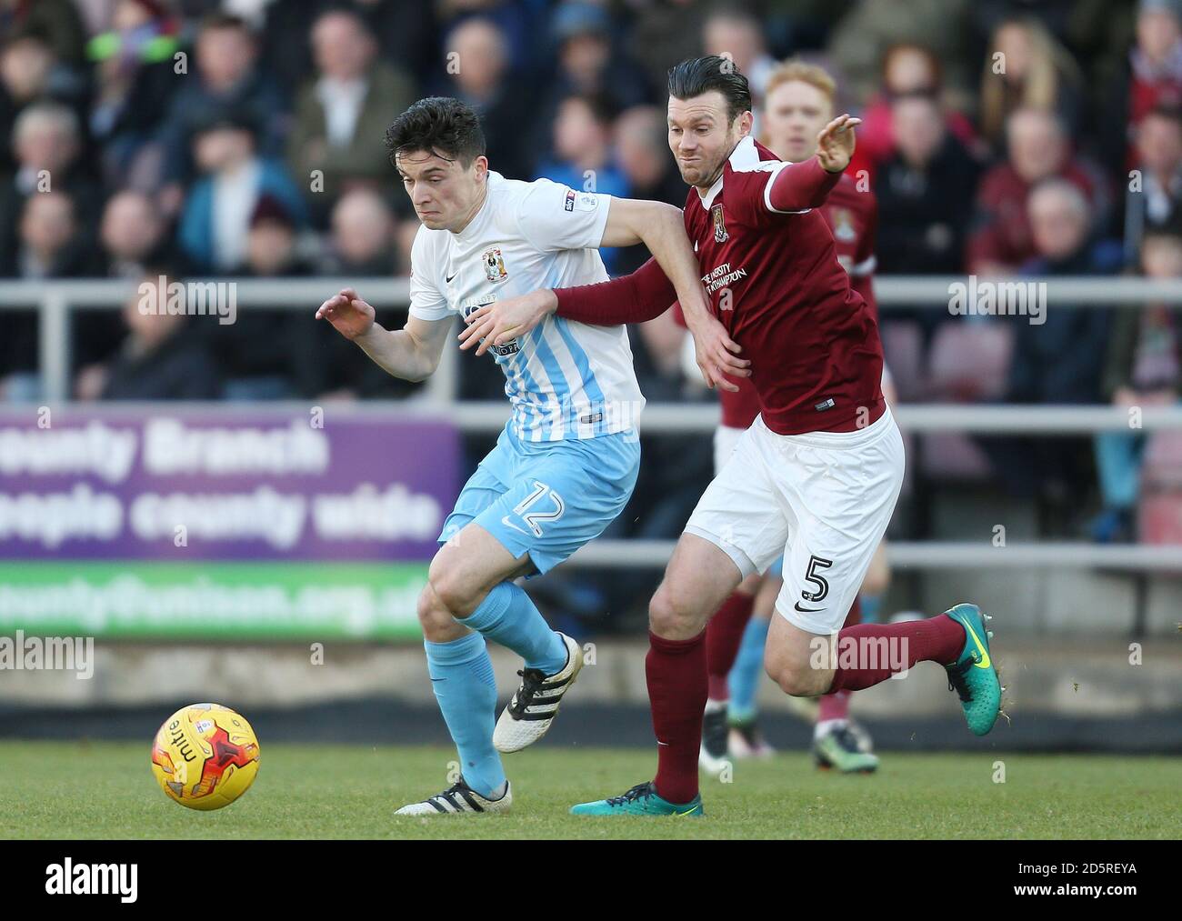 Northampton Town's Zander Diamond and Coventry City's Callum Reilly ...