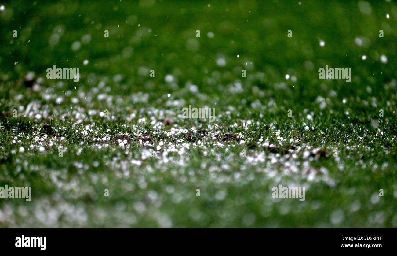 Hail on the pitch after a shower Stock Photo - Alamy