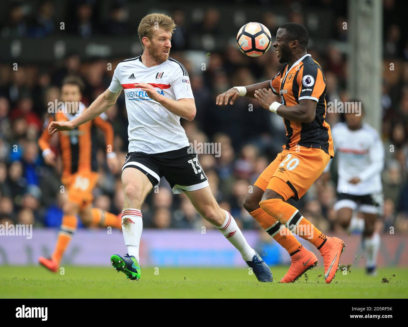 Fulham's Tim Ream (left) and Hull City's Adama Diomande battle for the ...